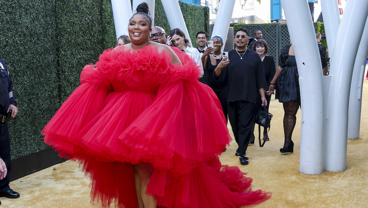 Lizzo Just Gifted Her Iconic 2022 Emmy Awards Tulle Gown To A Fan ...