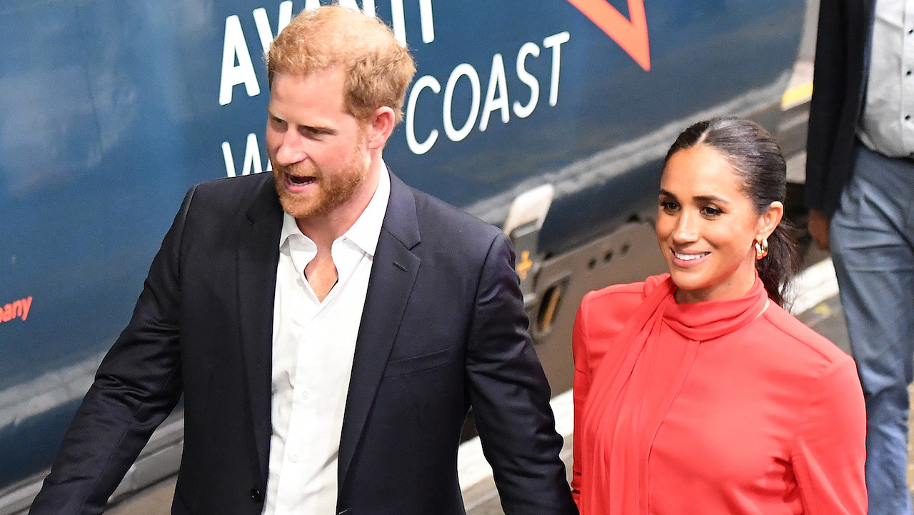Meghan Markle Opts For Top-To-Toe Red For Her Return To The UK - Grazia