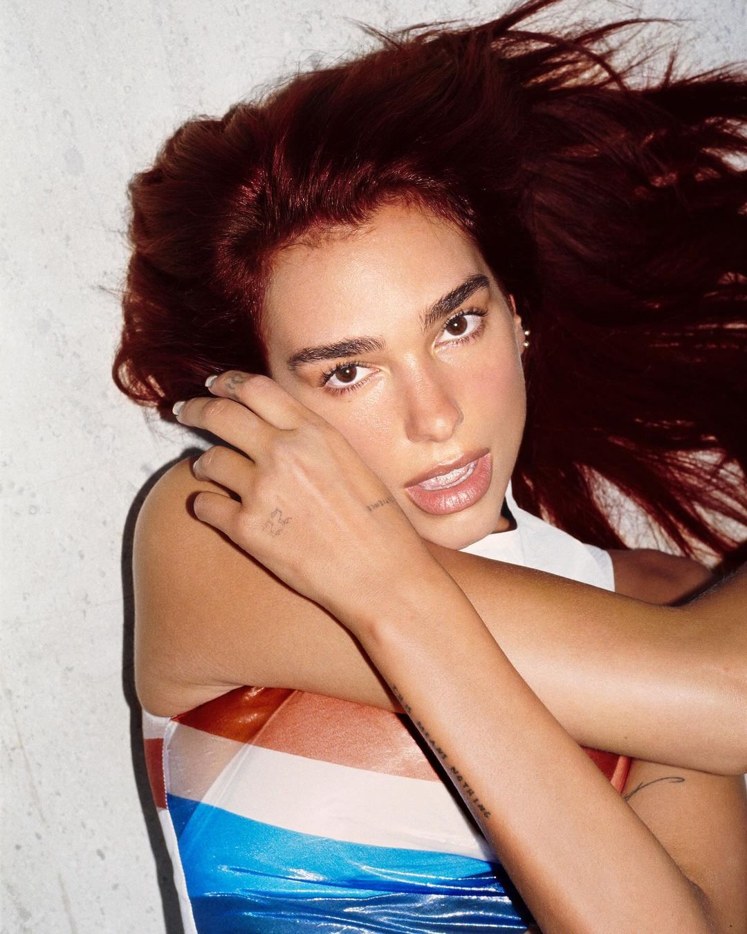 Dua Lipa Debuts New Auburn Hair To Confirm Upcoming Album