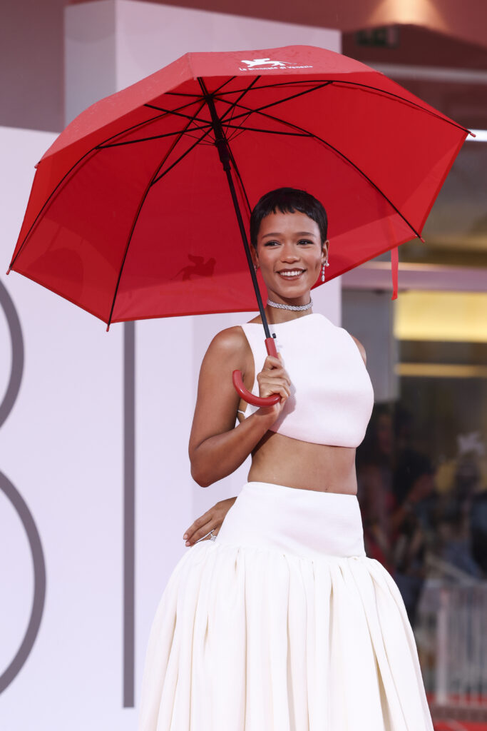Taylor Russell Bares Abs & All In Alaïa At The Venice Film Festival